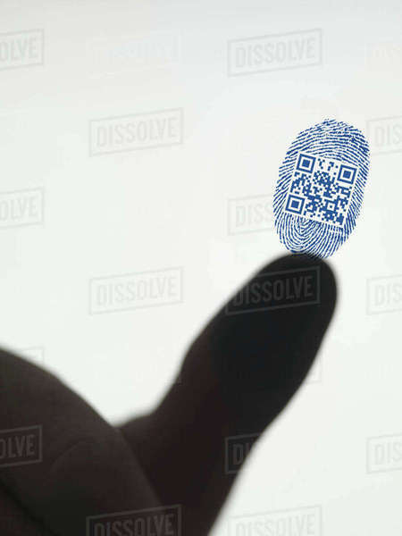 Finger leaving QR code in fingerprint - Royalty-free Stock Photo | Dissolve