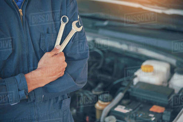 Mechanic car service auto garage in automotive mobile center. Technician workshop repair engine ...