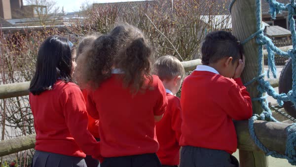 School Pupils Playing Hide And Seek At Breaktime - 4K Royalty-free ...