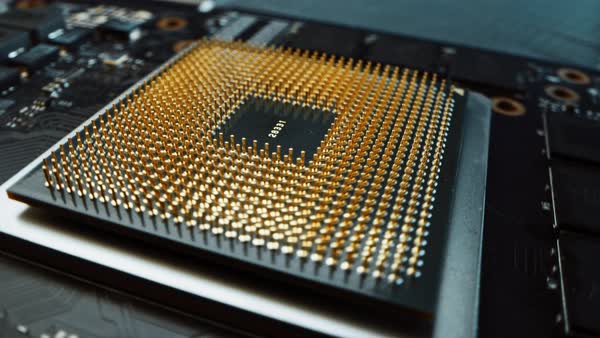 Focus on a CPU Processor Socket. Printed Circuit Board / Computer Motherboard with Components ...