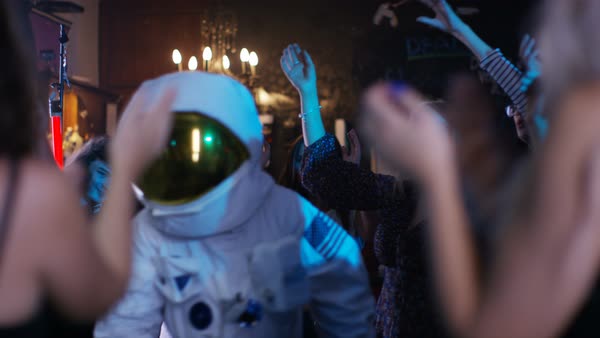 Funny astronaut breakdancing in the club with a crowd watching. - 4K Royalty-free Stock Video ...