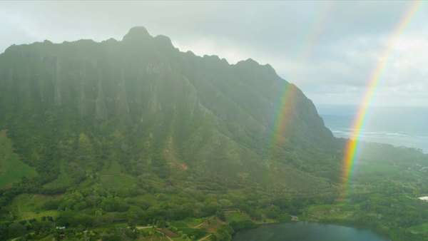 Aerial view of coloured rainbow Koolau mountain Range Windward side of ...