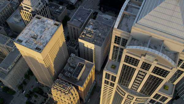Aerial overhead vertical view at sunset 1201 Third Avenue, downtown ...