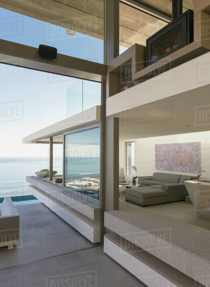 Modern, luxury home showcase interior living room with ocean view ...