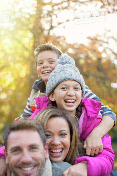 Portrait enthusiastic family hugging outdoors - Royalty-free Stock ...