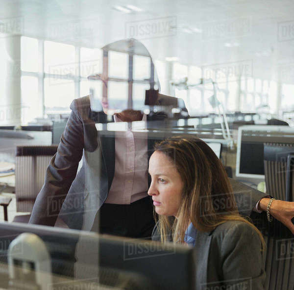 Businesswomen using computer in office - Royalty-free Stock Photo ...
