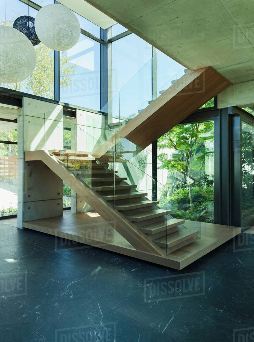 Modern floating staircase in home showcase interior - Stock Photo ...