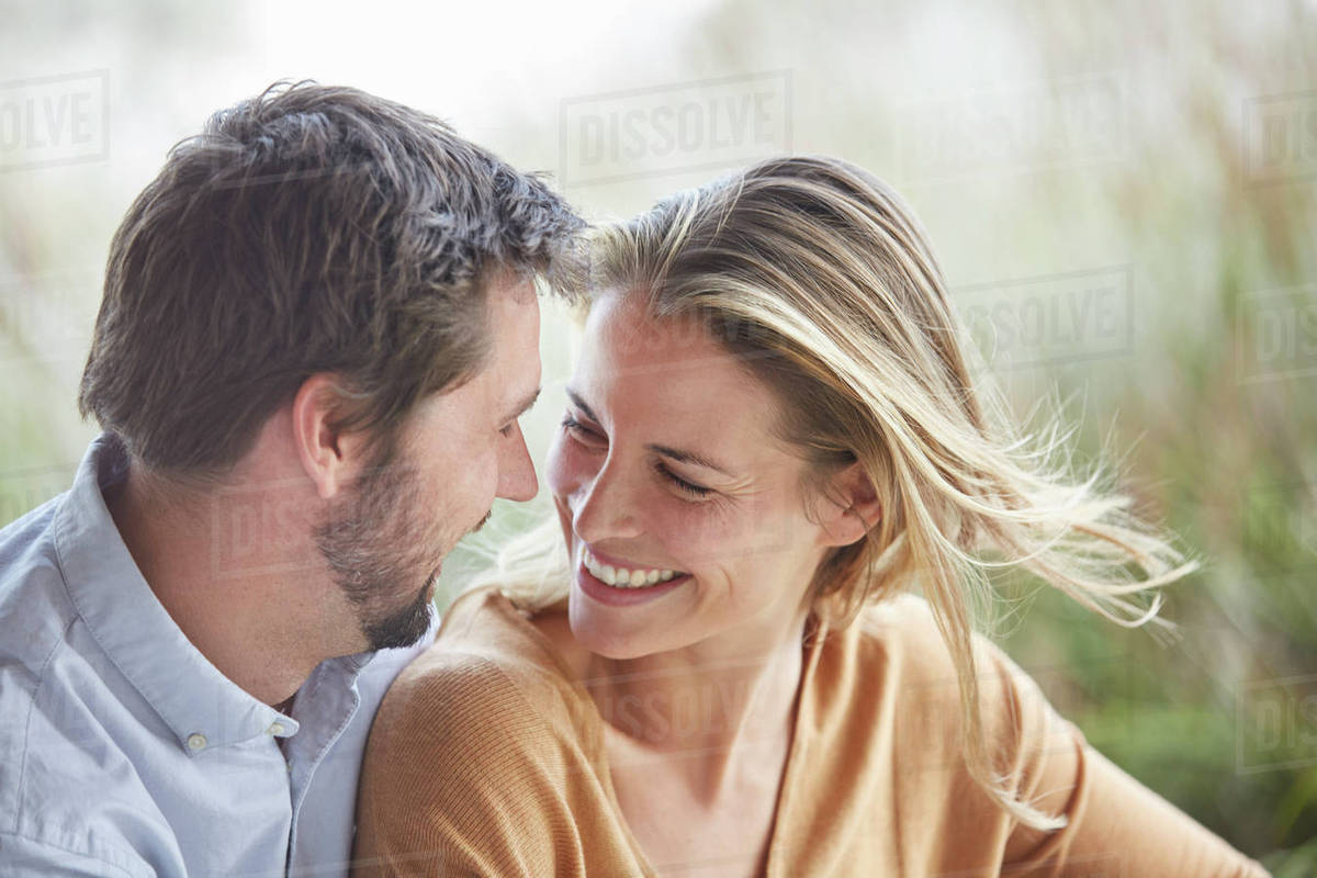 Smiling affectionate couple face to face - Royalty-free Stock Photo ...