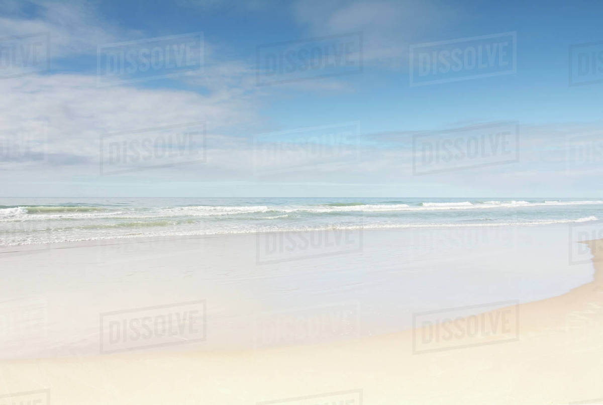 Empty beach on sunny day - Royalty-free Stock Photo | Dissolve