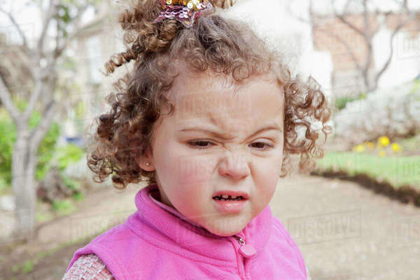 Girl with disgusted expression - Stock Photo - Dissolve