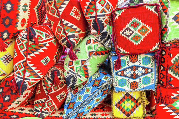 Bright textiles in market in Doha, Qatar - Stock Photo - Dissolve