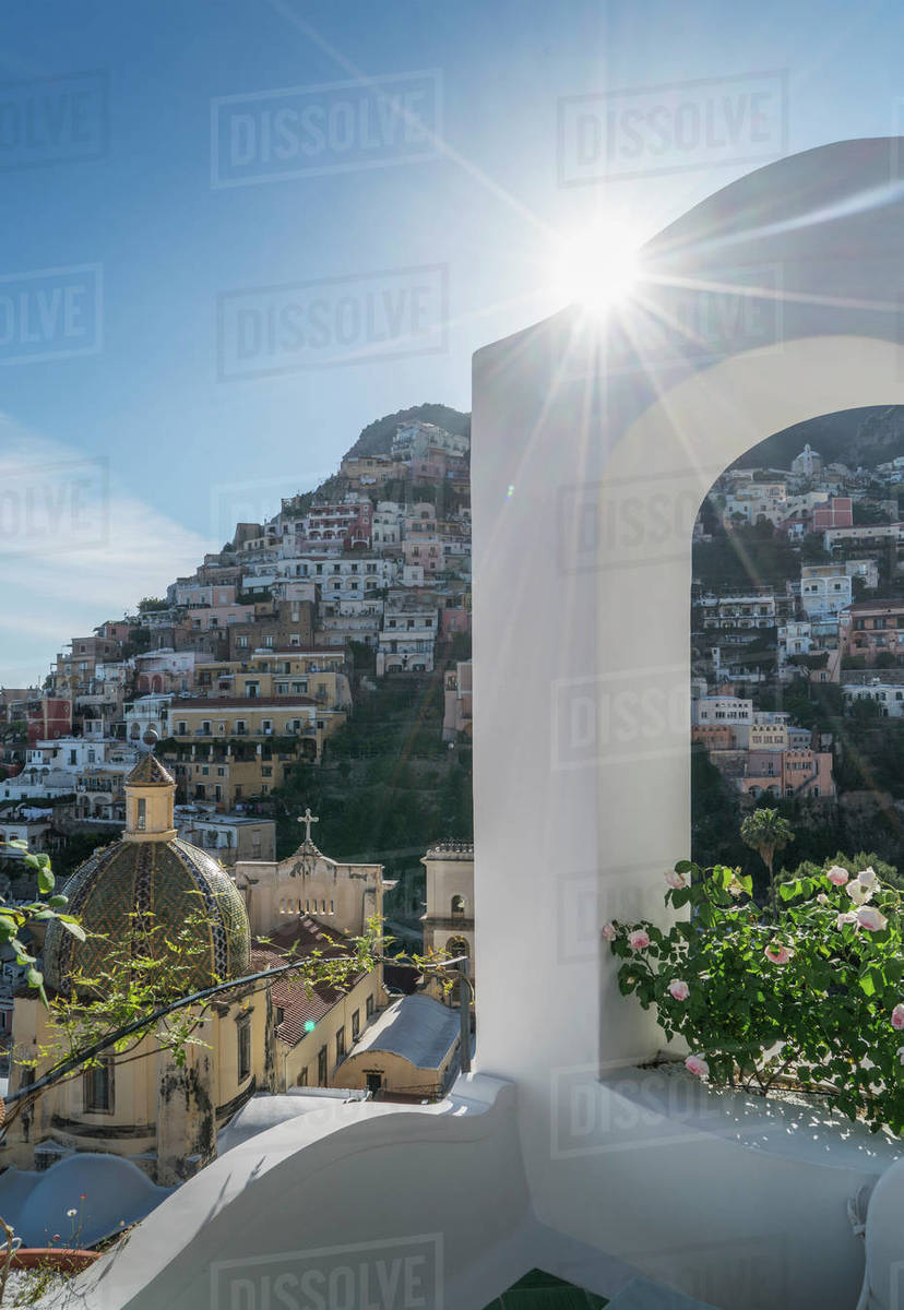 Sunbeam over whitewash arch in Positano on Amalfi Coast, Italy - Stock ...