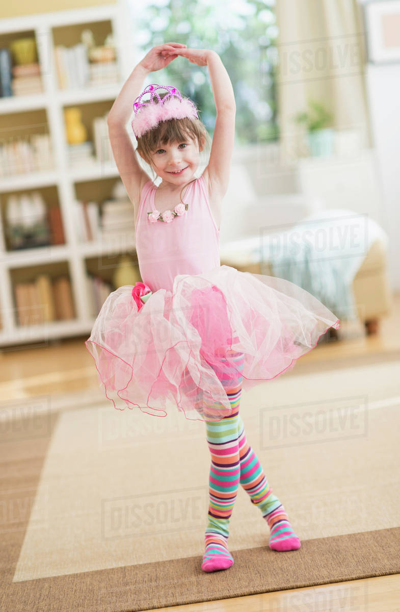 Girl (4-5) wearing tutu dancing in living room - Royalty-free Stock ...