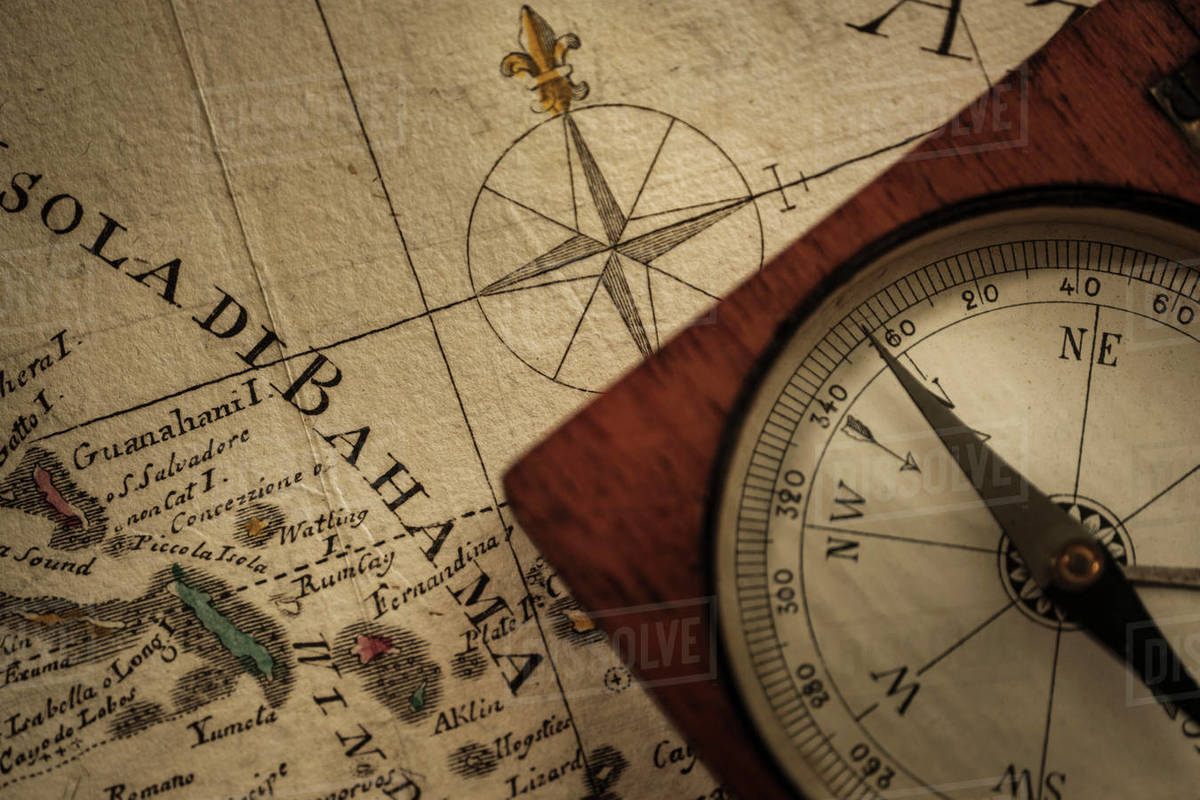 Antique compass on map - Royalty-free Stock Photo | Dissolve