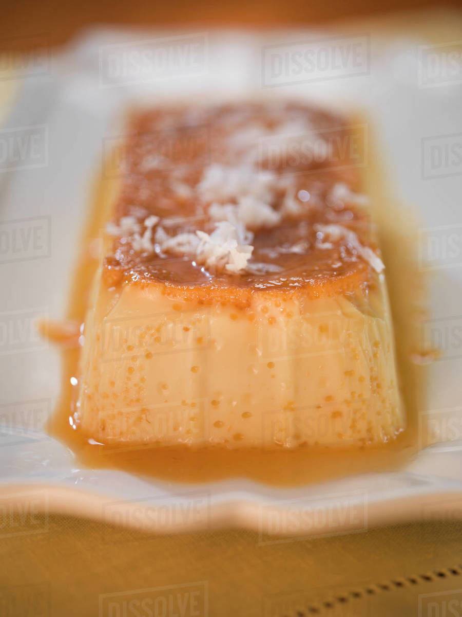 Close up of flan on plate - Royalty-free Stock Photo | Dissolve