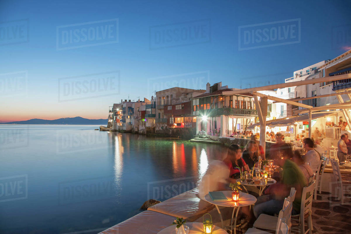 Waterfront restaurants at night in Mykonos, Greece - Royalty-free Stock ...