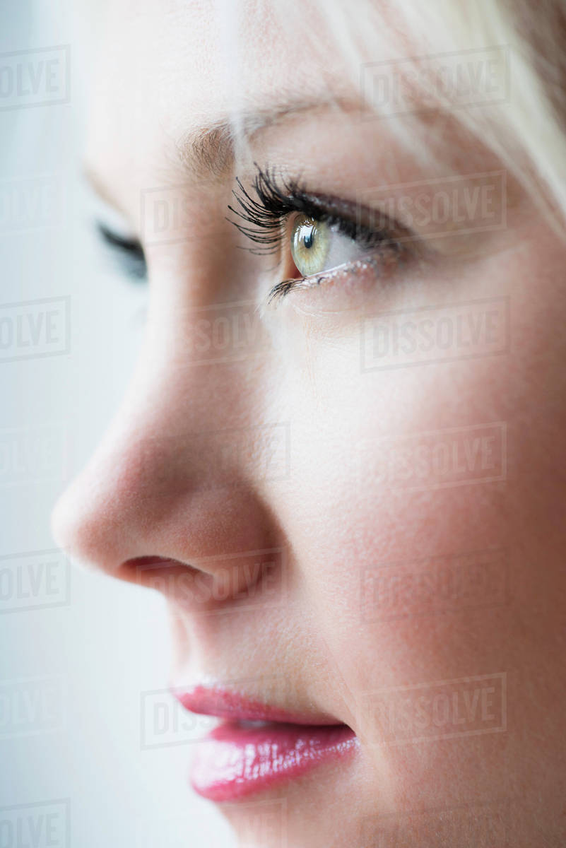 Profile of blonde woman - Stock Photo - Dissolve