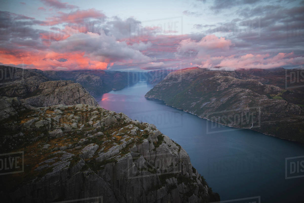 Preikestolen cliff by Lysefjord at sunset in Rogaland, Norway - Royalty ...