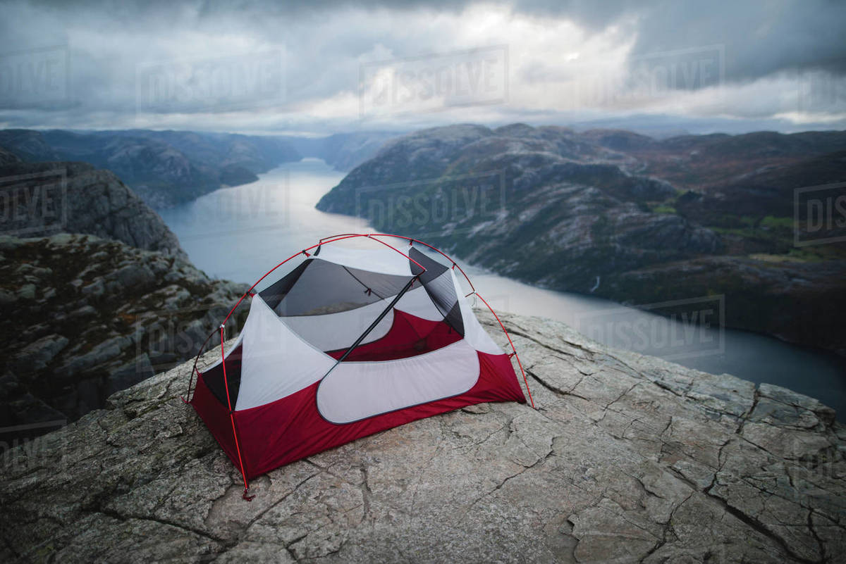 Tent on Preikestolen cliff in Rogaland, Norway - Stock Photo - Dissolve