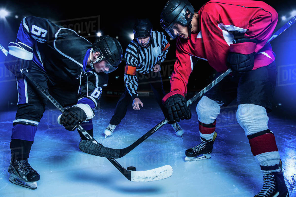 Hockey players and referee starting match - Royalty-free Stock Photo ...