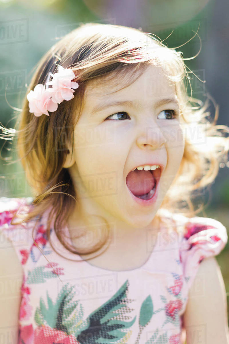 Portrait of girl laughing - Royalty-free Stock Photo | Dissolve