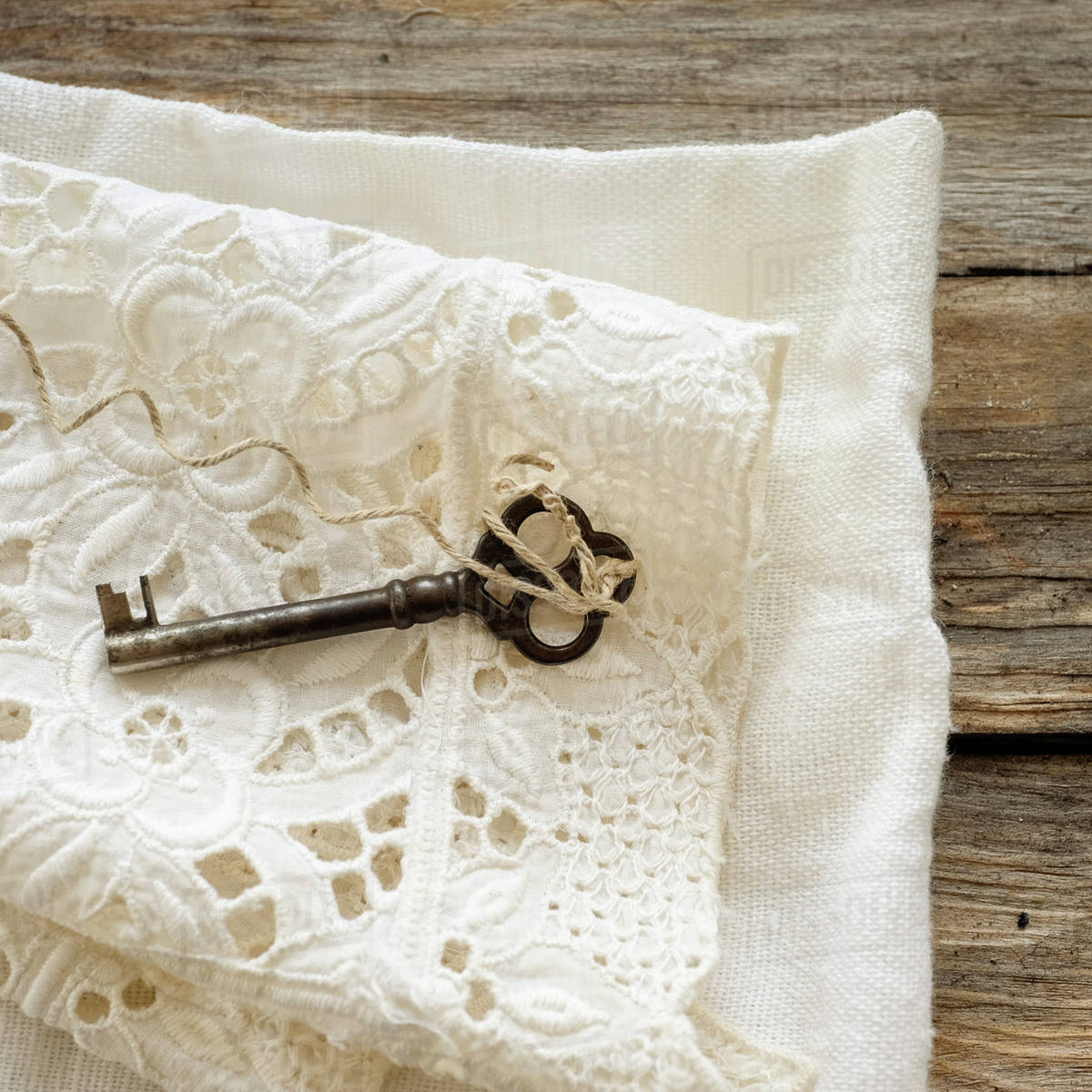 Studio shot of antique key on lace cloth - Royalty-free Stock Photo ...