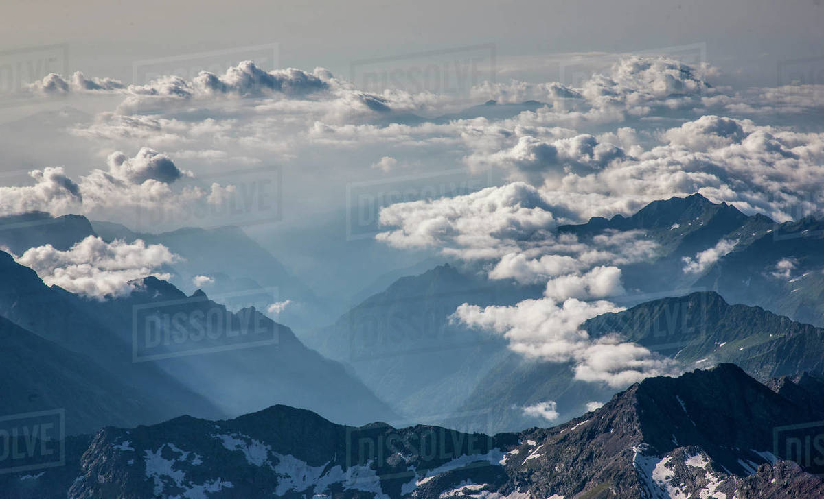 Switzerland, Monte Rosa, Aerial view of Monte Rosa Massif in clouds ...