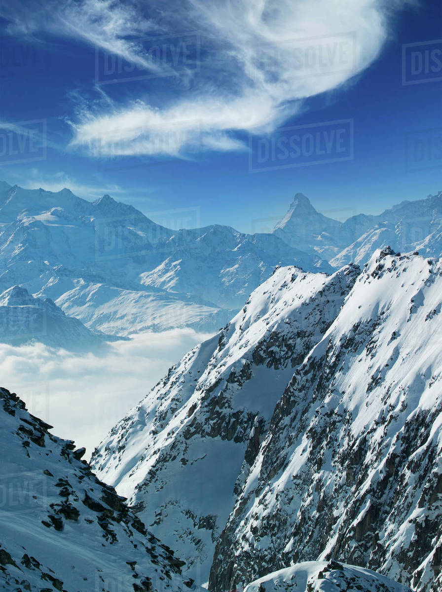 Switzerland, Canton Wallis, Brig, Snow covered mountains in winter ...