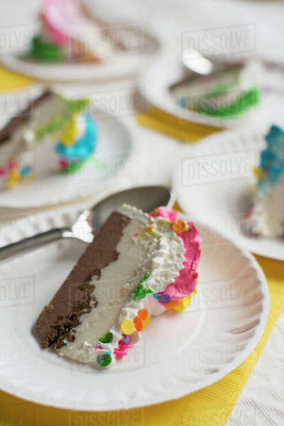 Close-up of birthday cake slice - Royalty-free Stock Photo | Dissolve
