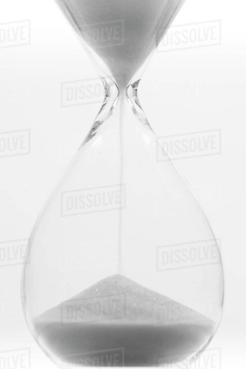Studio shot of hourglass - Royalty-free Stock Photo | Dissolve