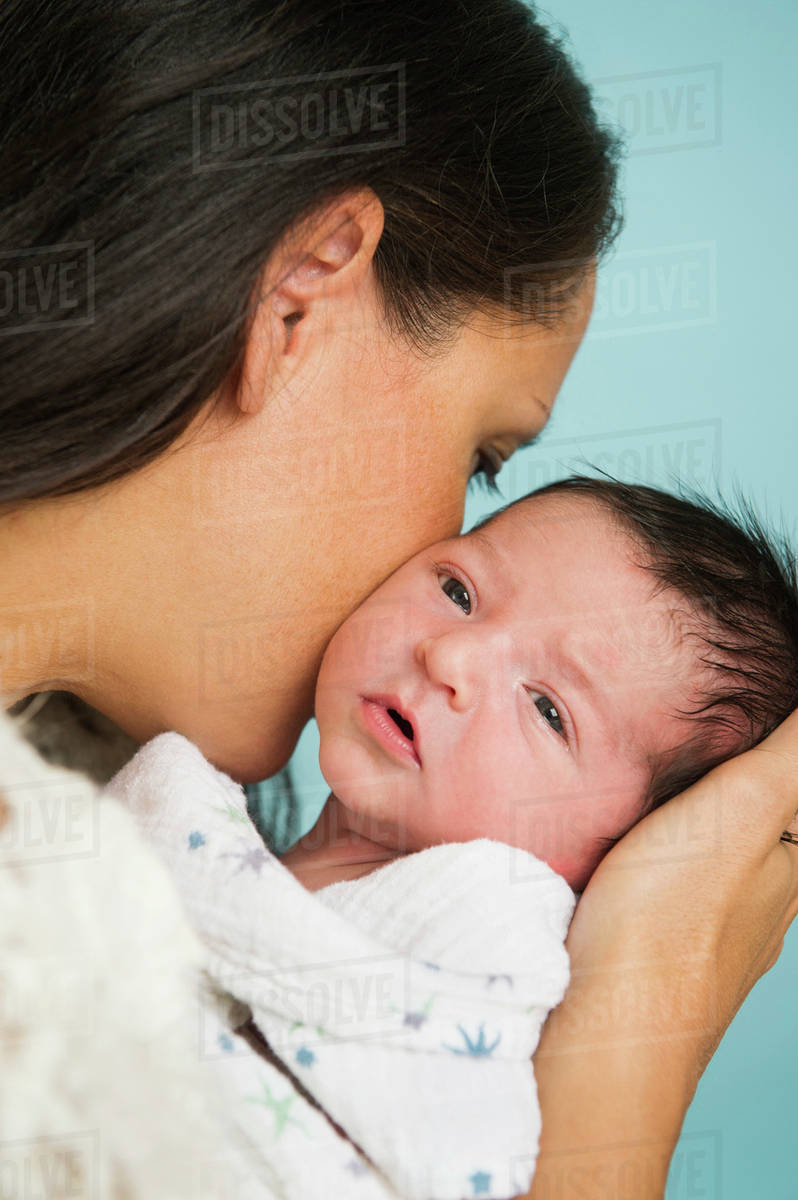 Portrait of mother holding newborn baby (0-11 months) - Stock Photo ...