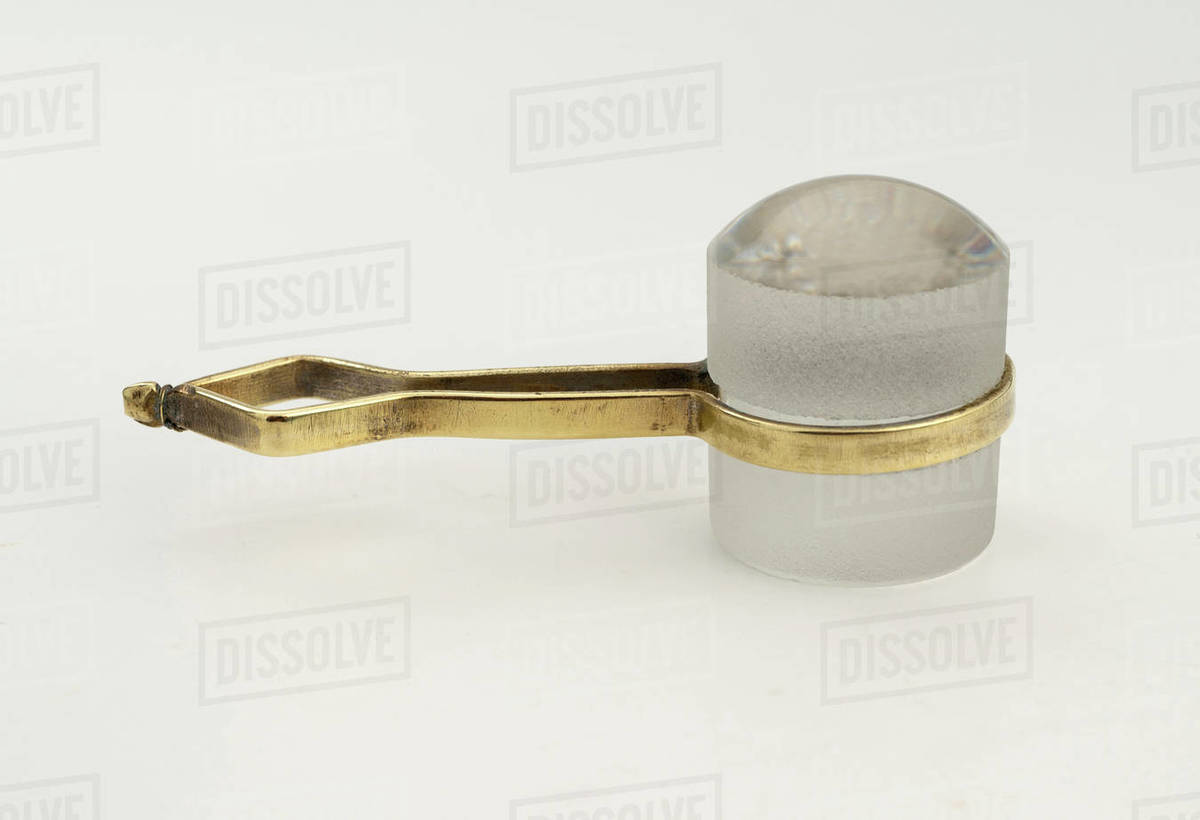 Stanhope magnifier with brass handle on white background - Stock Photo ...