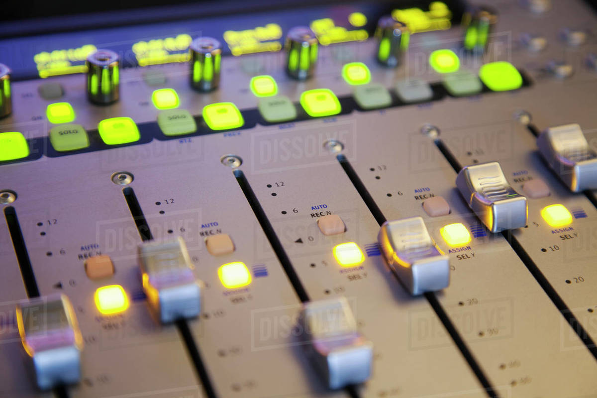 Mixing console in recording studio - Stock Photo - Dissolve