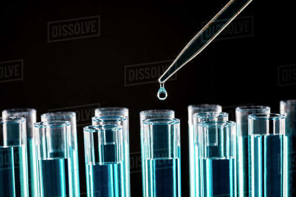 Pipette dropping liquid into test tube - Royalty-free Stock Photo ...