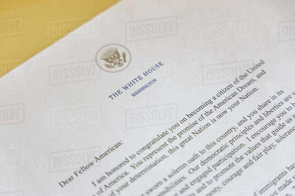US citizenship welcome letter from President - Stock Photo - Dissolve