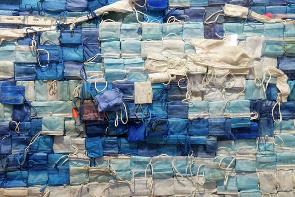 Wall of recycled face masks - Royalty-free Stock Photo | Dissolve