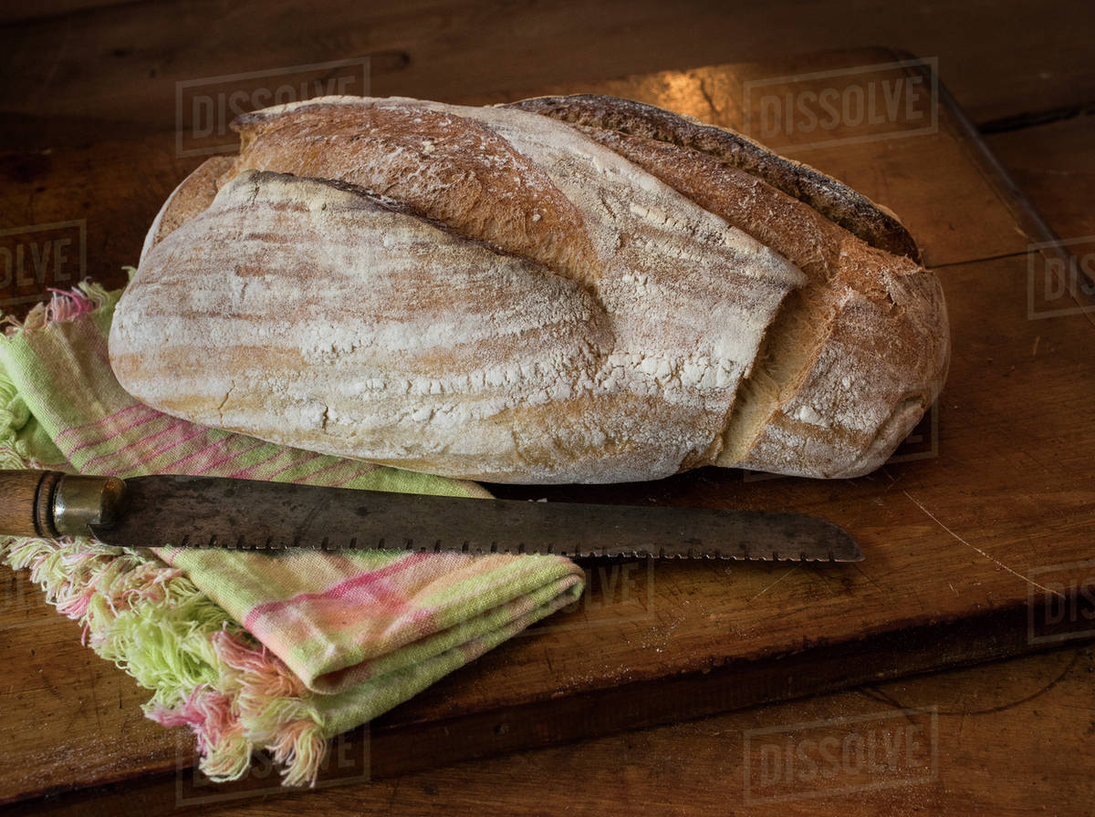 Fresh bread on wood - Royalty-free Stock Photo | Dissolve