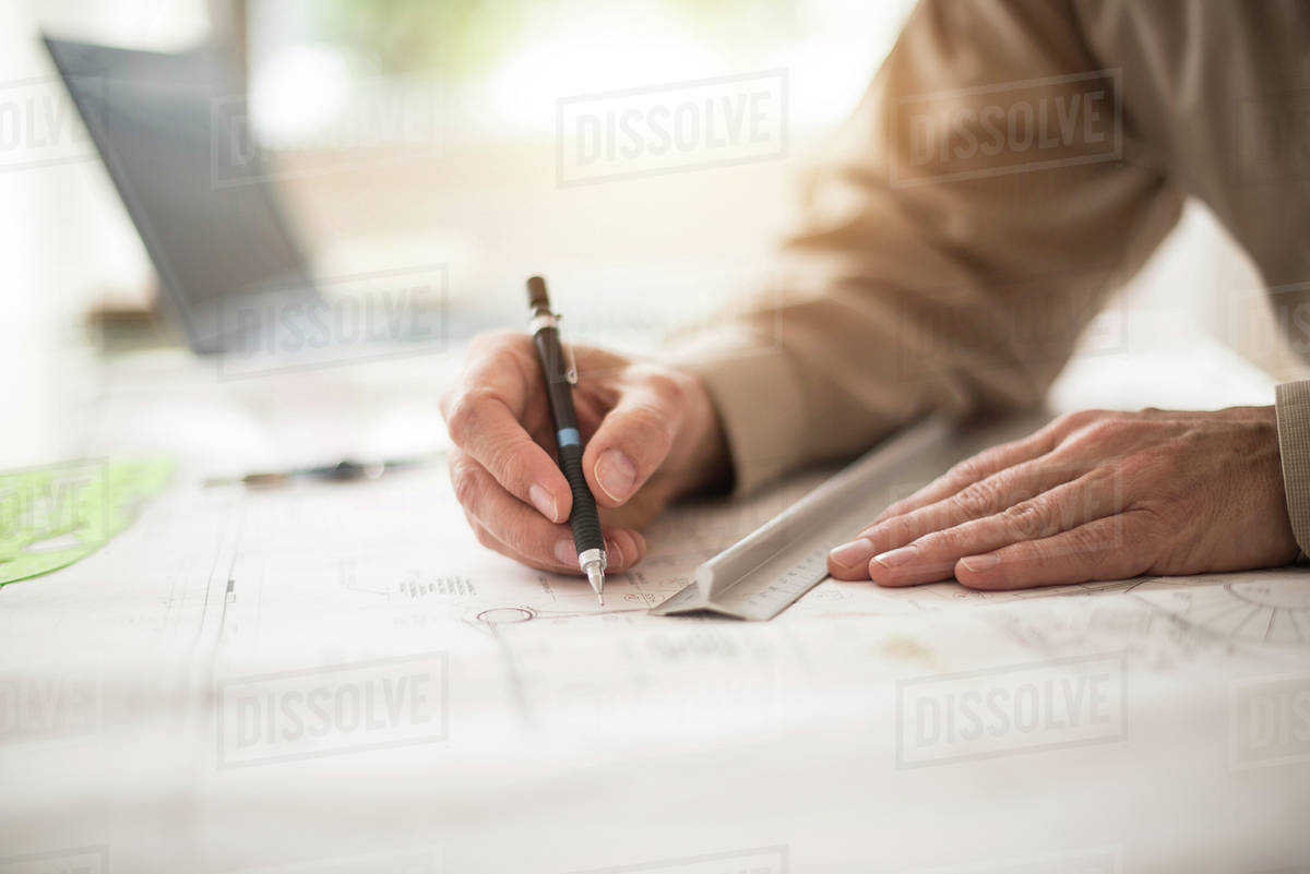 Close up of architect's hands drawing on blueprint - Royalty-free Stock ...