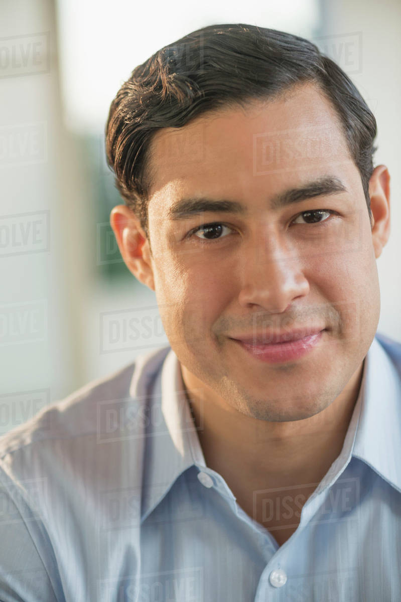 Portrait of smiling male executive in office - Royalty-free Stock Photo ...