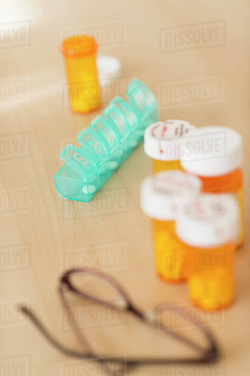 Pills on table - Royalty-free Stock Photo | Dissolve