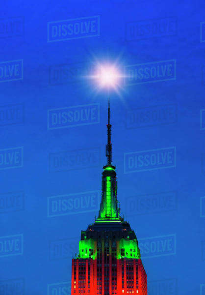 Empire State Building illuminated in red and green - Royalty-free Stock ...
