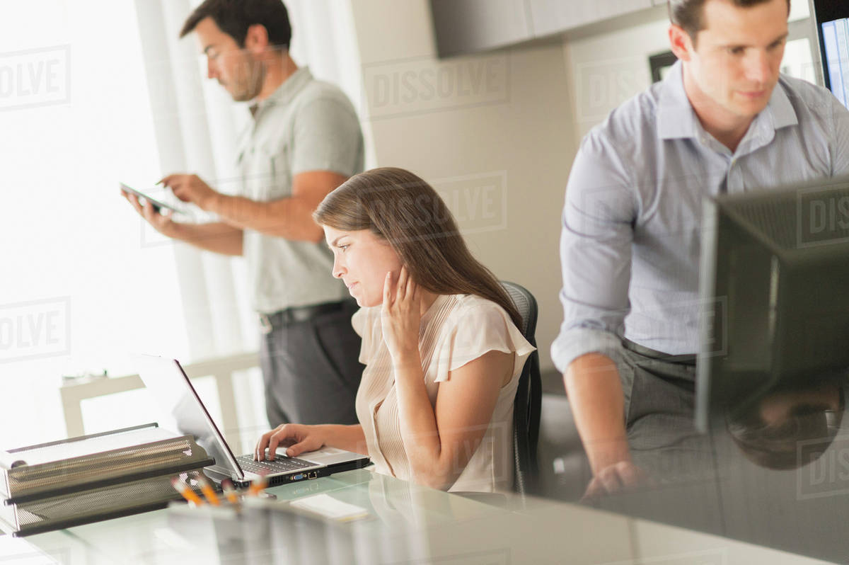Business people working in office - Royalty-free Stock Photo | Dissolve