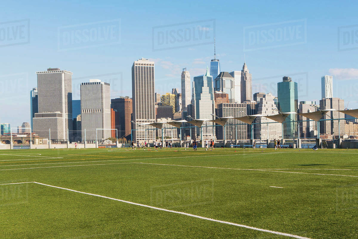 Soccer field and cityscape - Royalty-free Stock Photo | Dissolve