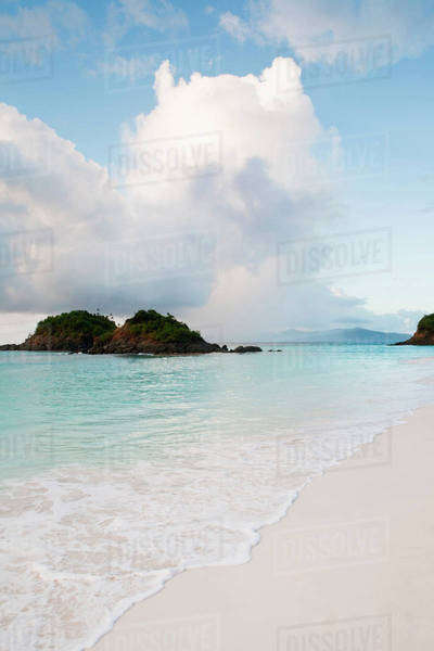 Scenic view of beach by sea - Stock Photo - Dissolve