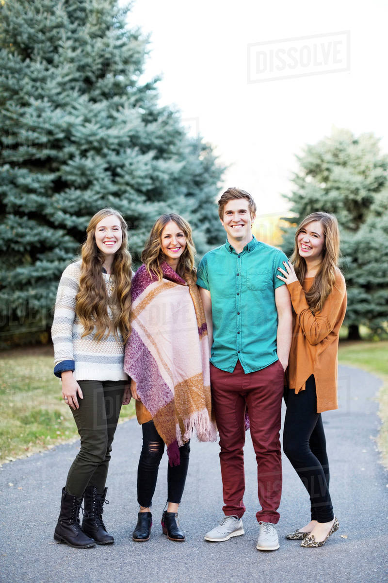 Portrait of four friends smiling - Royalty-free Stock Photo | Dissolve