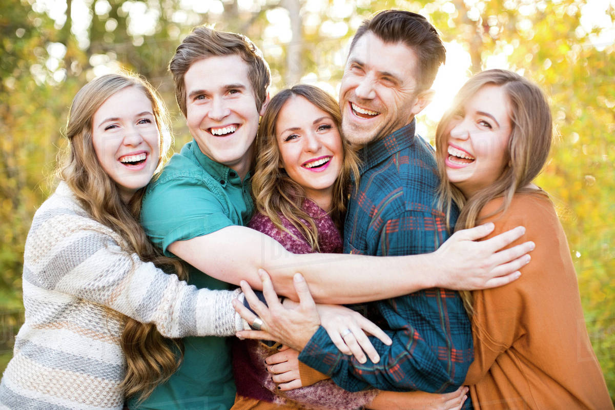 Portrait of five smiling friends - Royalty-free Stock Photo | Dissolve