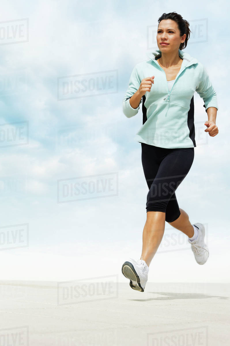 Woman jogging - Royalty-free Stock Photo | Dissolve
