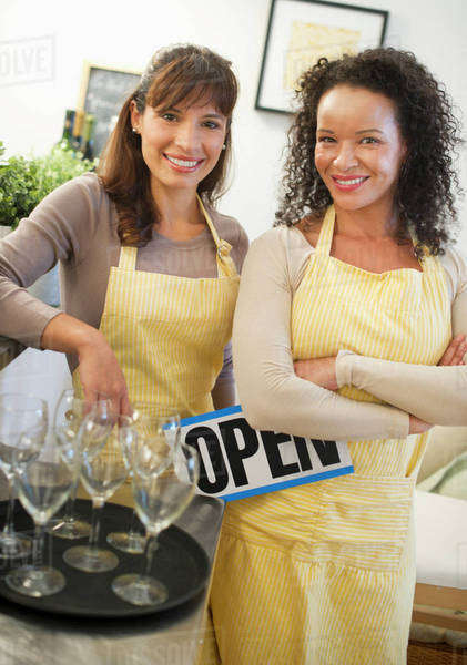 Two female business owners in restaurant - Stock Photo - Dissolve