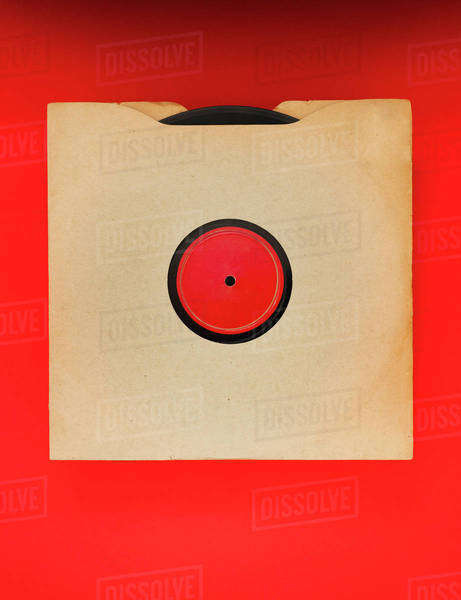 Vinyl record in envelope on red background, studio shot - Royalty-free ...