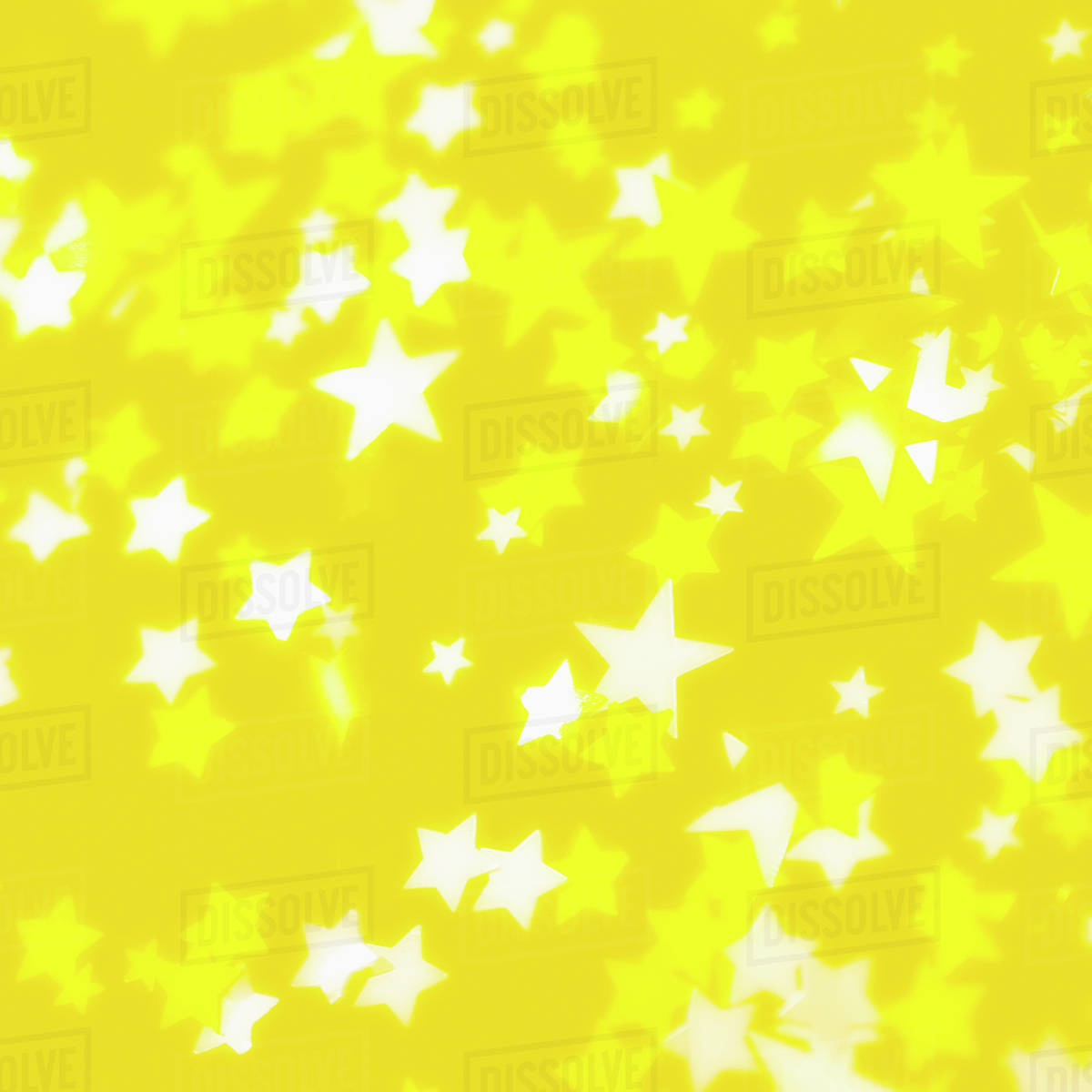 Yellow backgrounds with white stars - Stock Photo - Dissolve